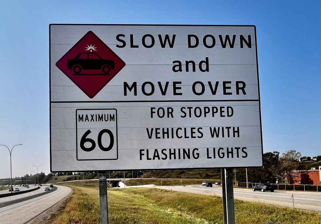 Passing an emergency vehicle - Roadside worker safety rules - iDrive ...